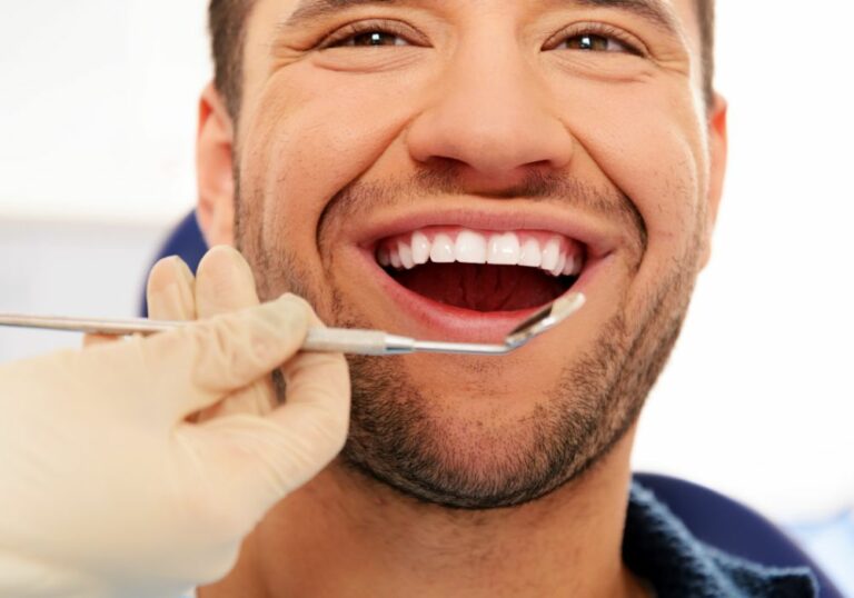 Why Is My Tooth Grey Under My Crown? (Causes & Treatment)