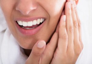 Can Throbbing Tooth Pain Go Away? (Causes & Treatments)