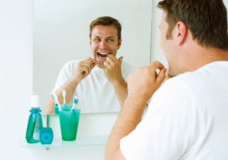 Why does food keep getting stuck between my gum and tooth?