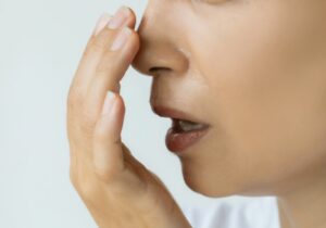Why Does My Back Tooth Smell Bad? (Causes & Dental Treatments)