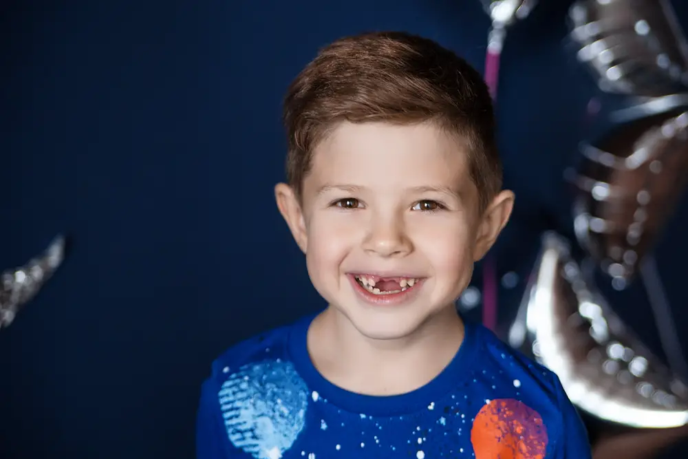 Why Doesn't Dustin Have Teeth In Season 3? (Three Explanations)